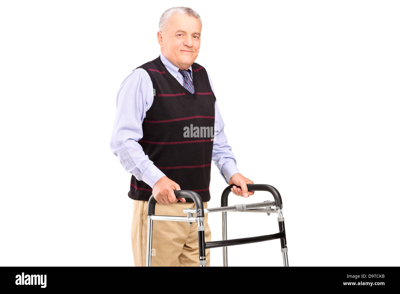 Mature gentleman using a walker Stock Photo - Alamy