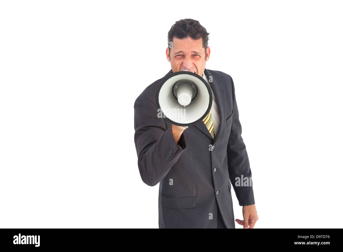 Businessman shouting into a megaphone Stock Photo - Alamy