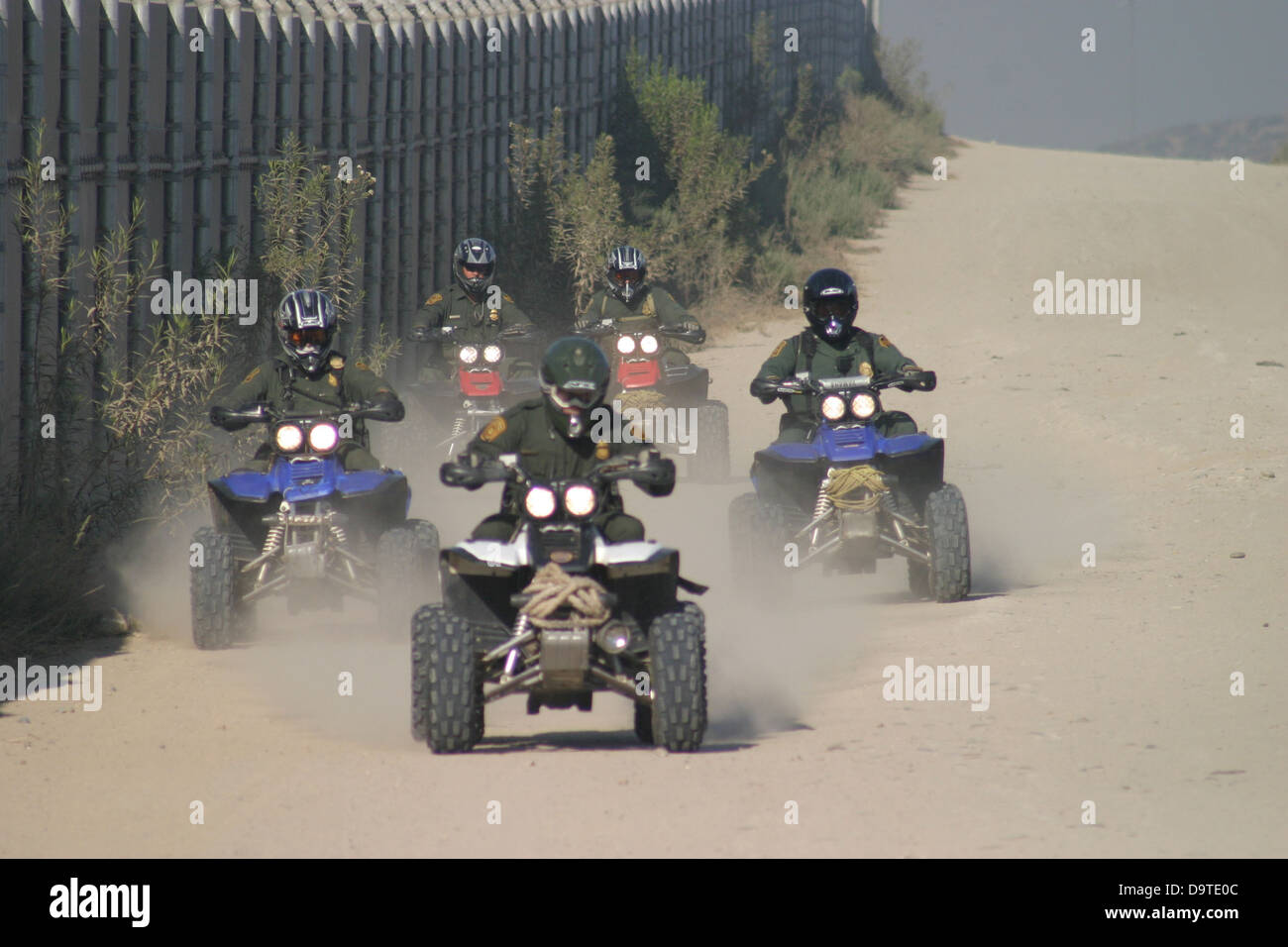 A photograph of a U.S. Border Patrol ATV in action, capturing the ...