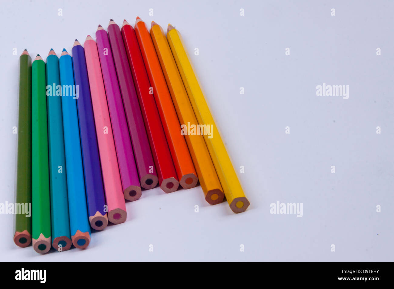 Pallet of colourful crayons on white background Stock Photo - Alamy