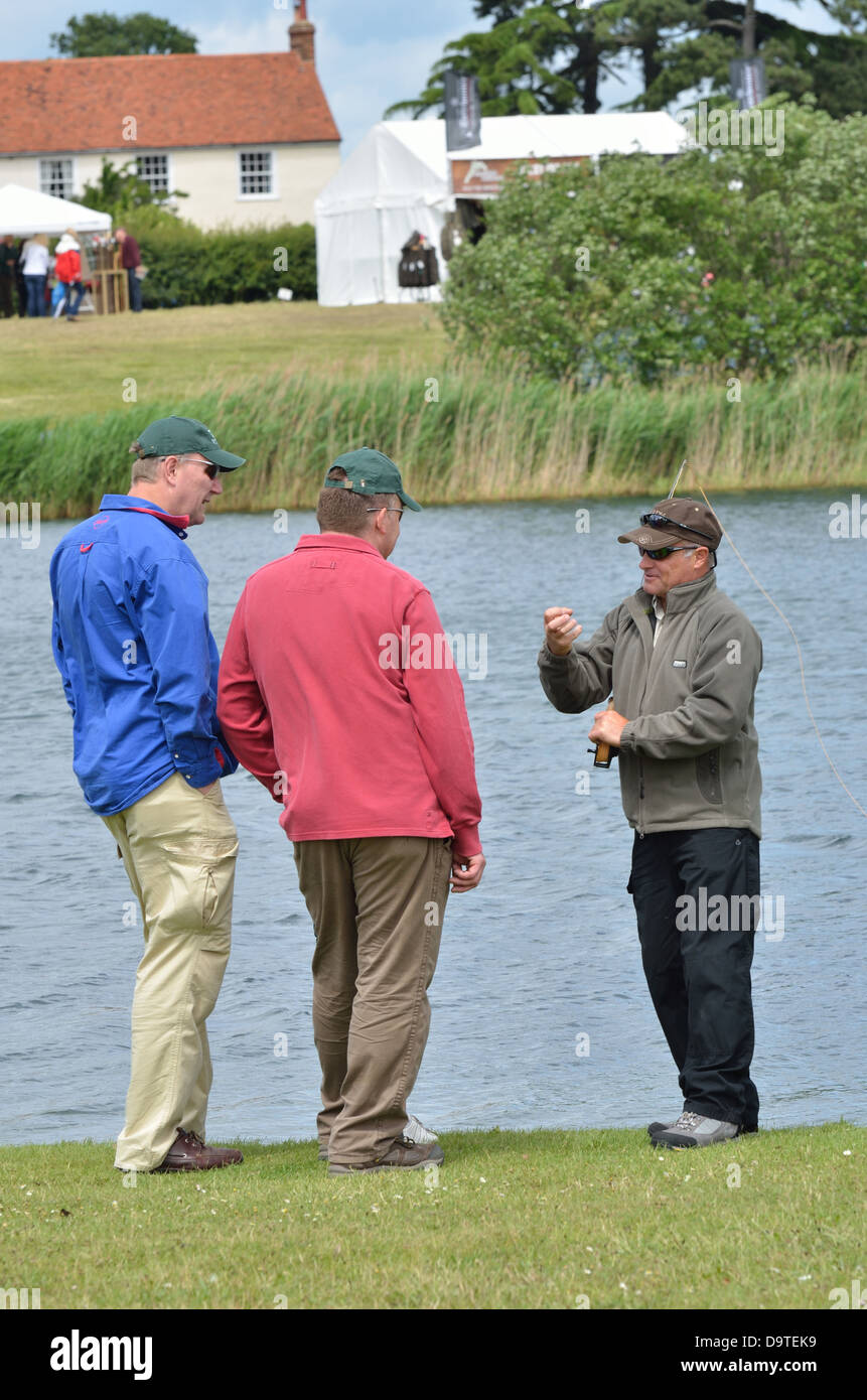 Men discussing sport hi-res stock photography and images - Alamy