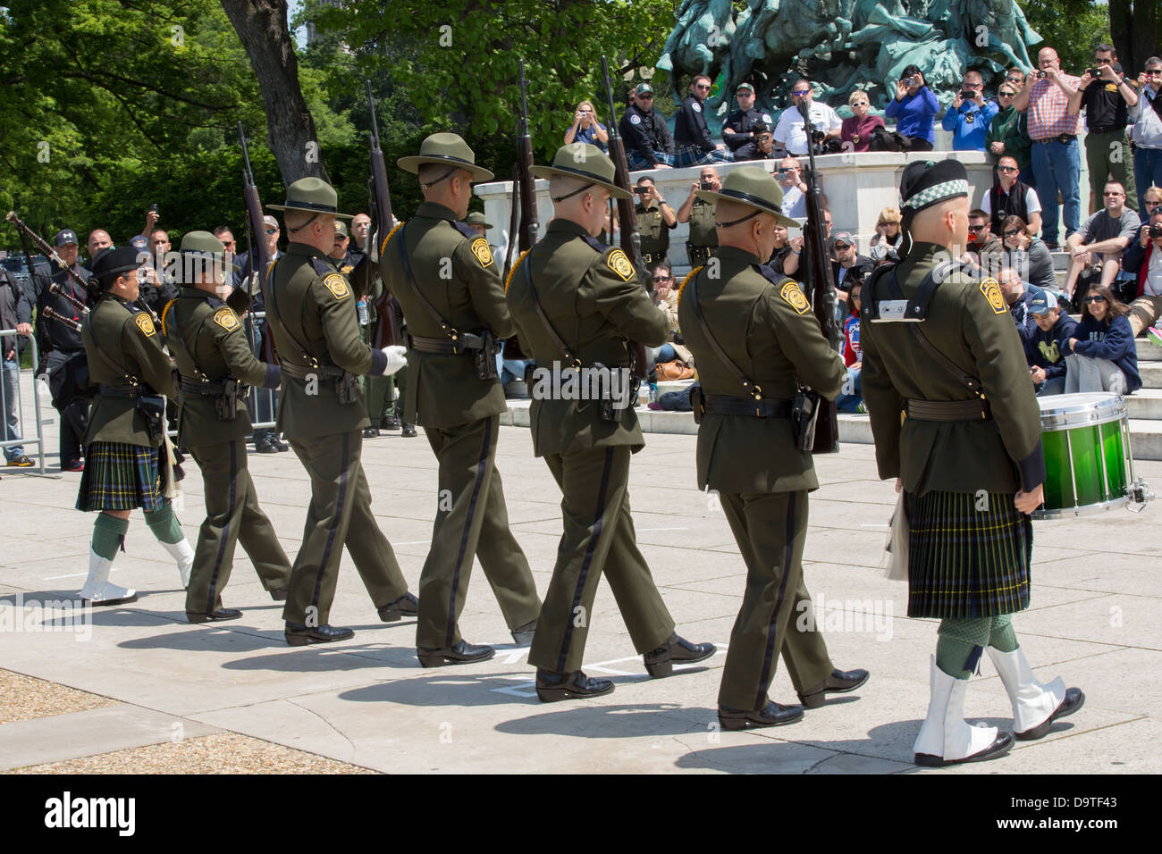 This image features the BP Drill Team 32 in action. The team is seen ...
