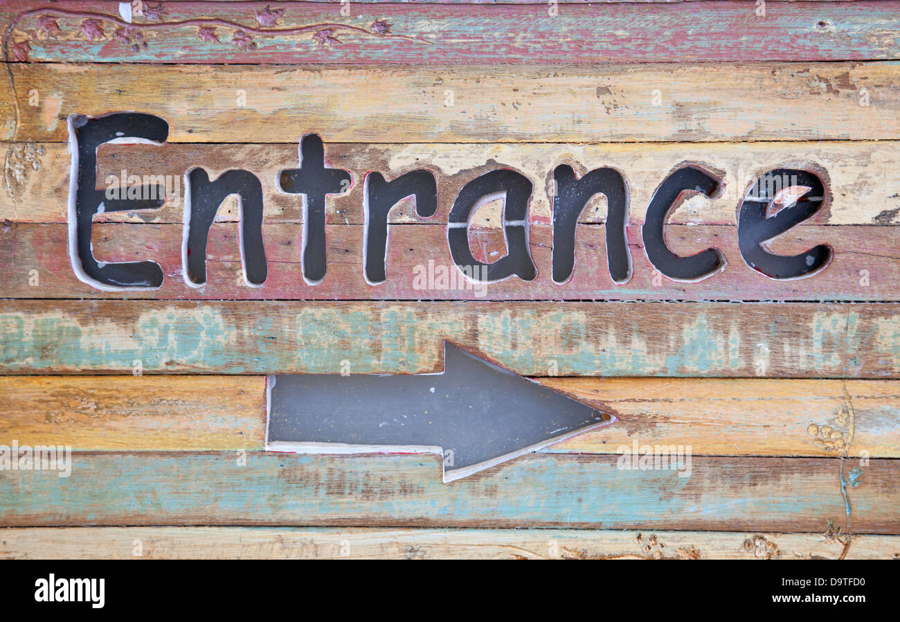 entrance arrow sign on wooden Stock Photo - Alamy