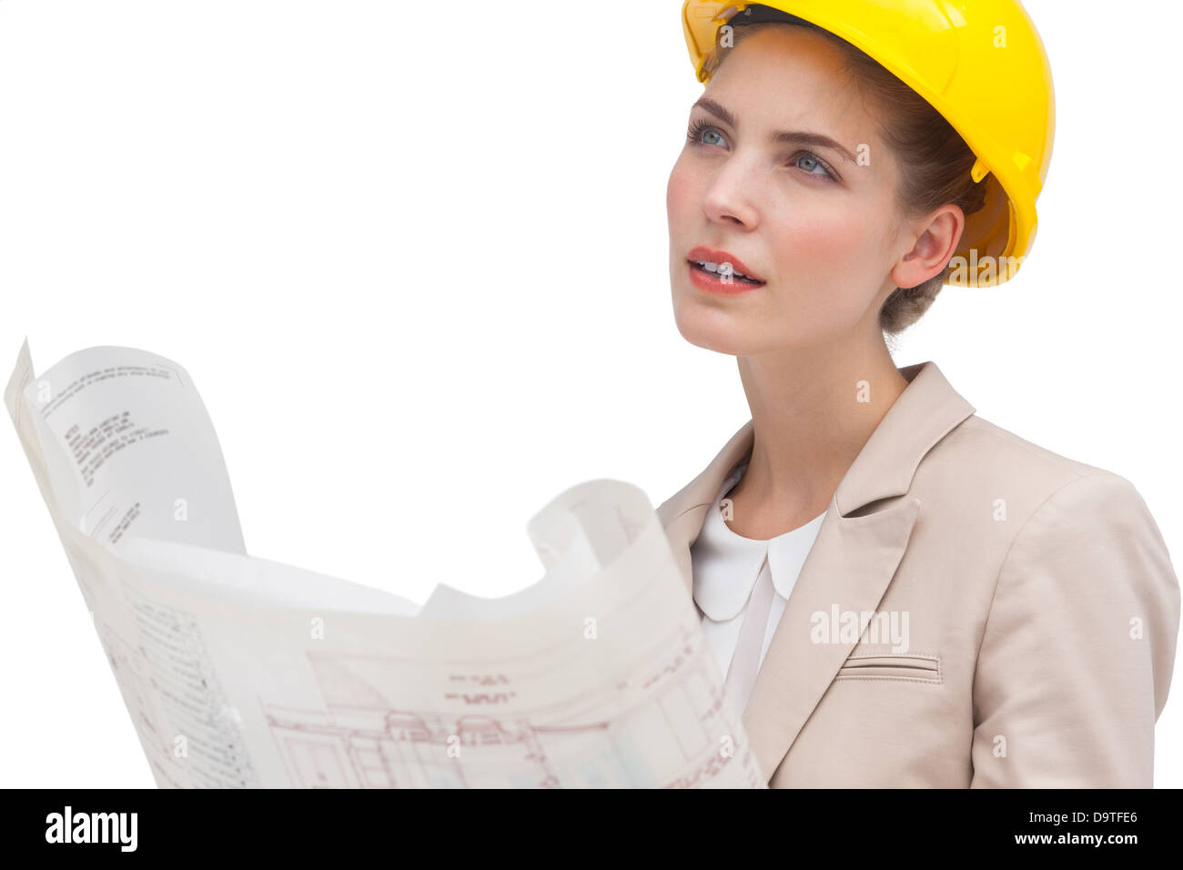 Young attractive woman architect yellow background hi-res stock ...