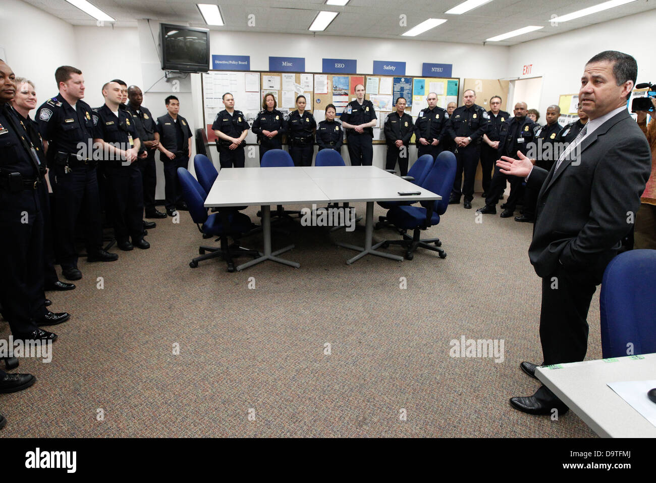 This image shows U.S. Customs and Border Protection officers performing ...