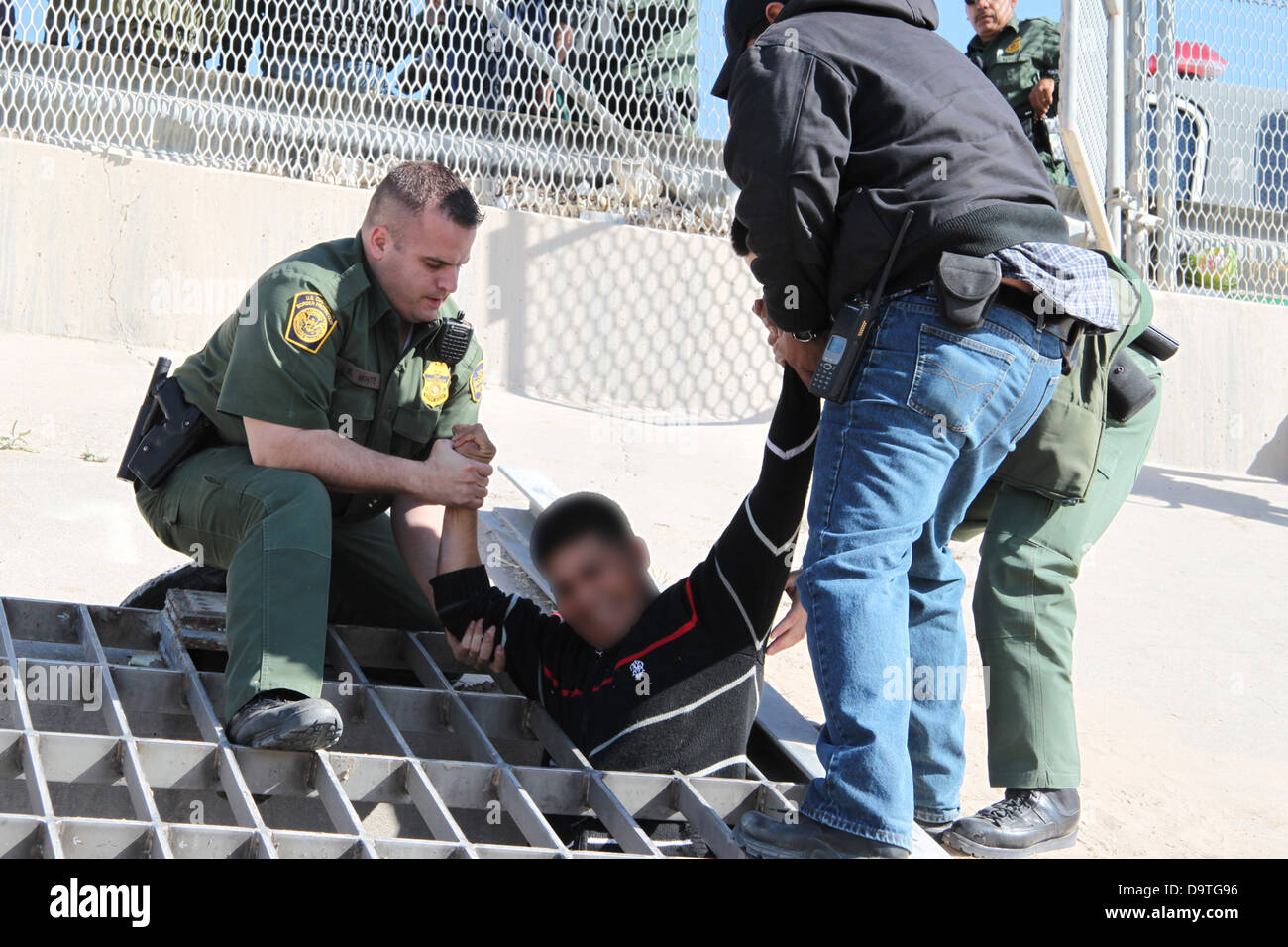 A photo showing U.S. Customs and Border Protection agents rescuing ...
