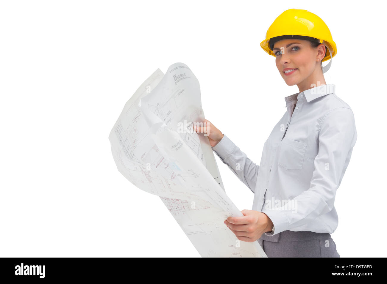 Happy architect holding plan Stock Photo - Alamy