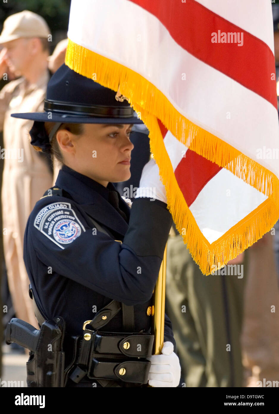 A photograph of U.S. Customs and Border Protection officers paying ...