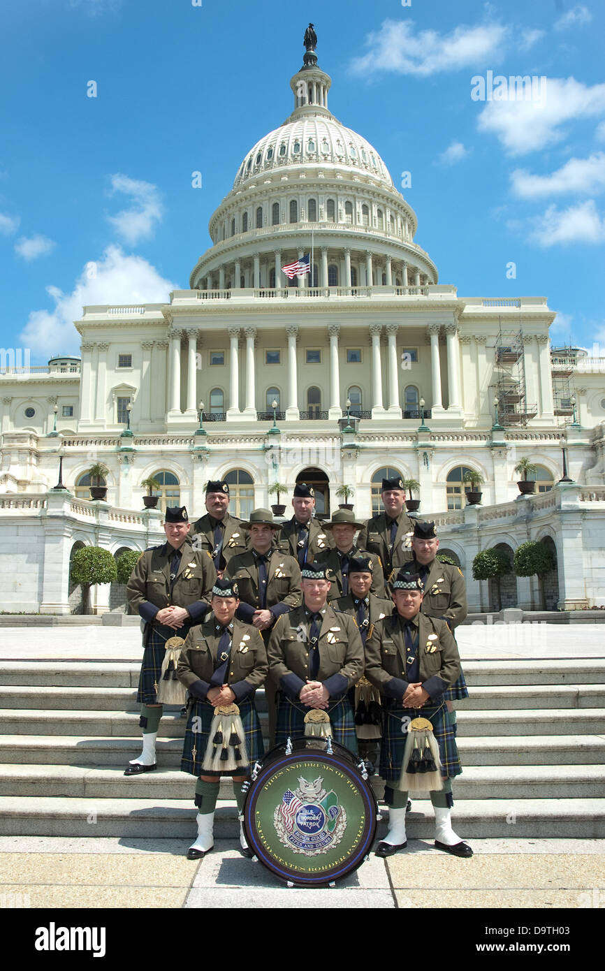 The U.S. Customs and Border Protection Pipes and Drums perform during a ...