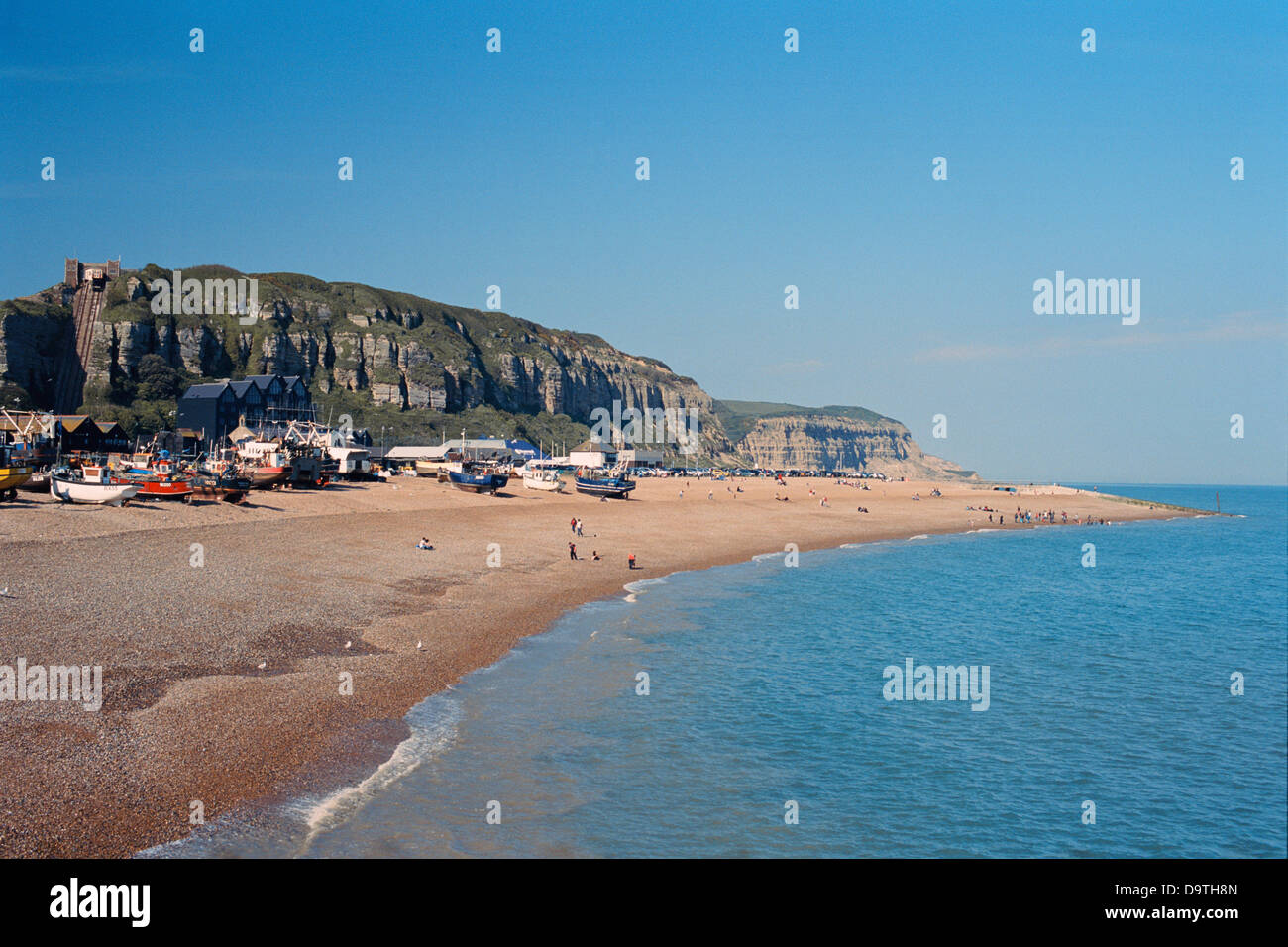 Hastings seafront, East Sussex, with the Stade, fishing boats and East ...