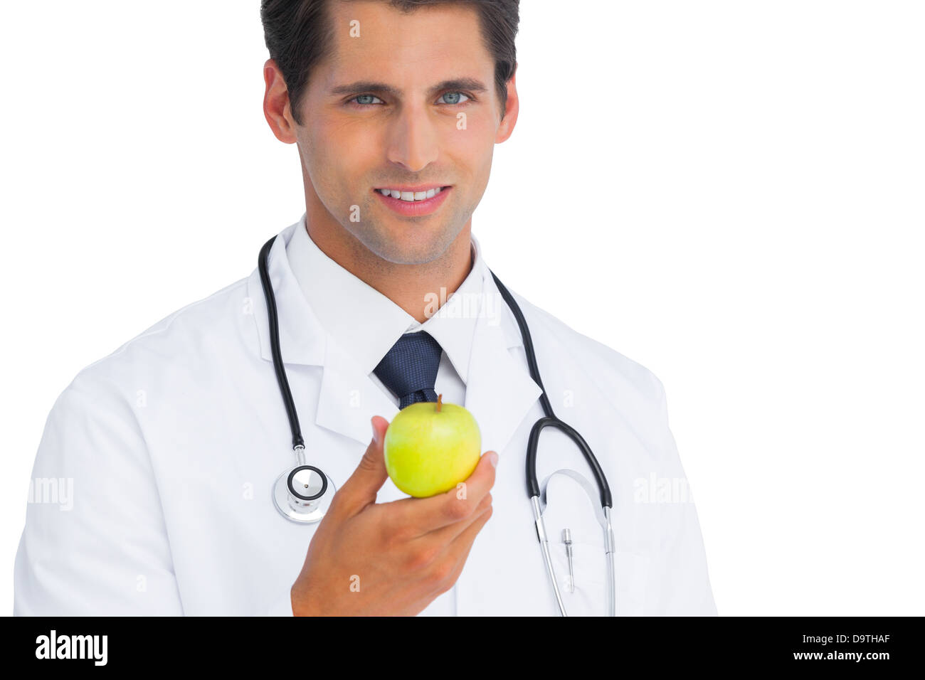 Male doctor smiling holding copy hi-res stock photography and images ...