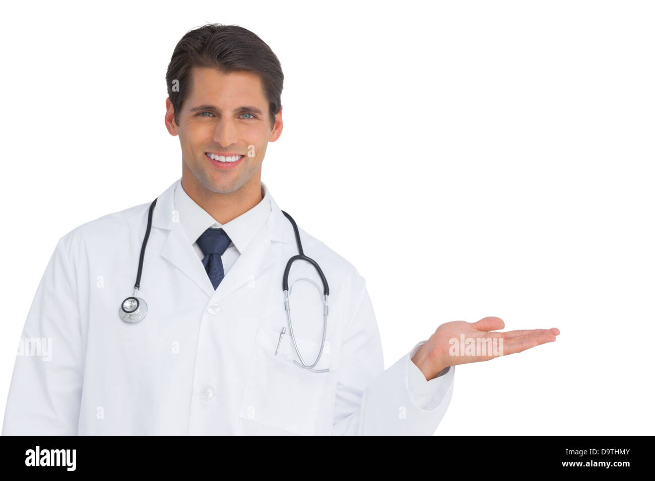 Cheerful male doctor showing copy hi-res stock photography and images ...