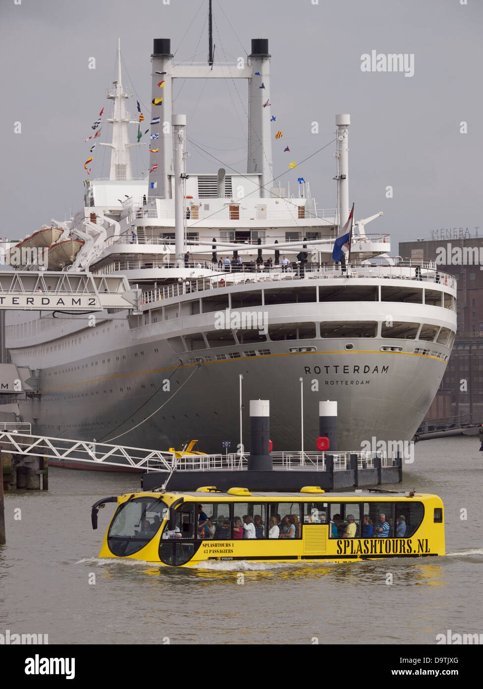 Amphibious tourist bus sailing past the SS Rotterdam retired cruise ...