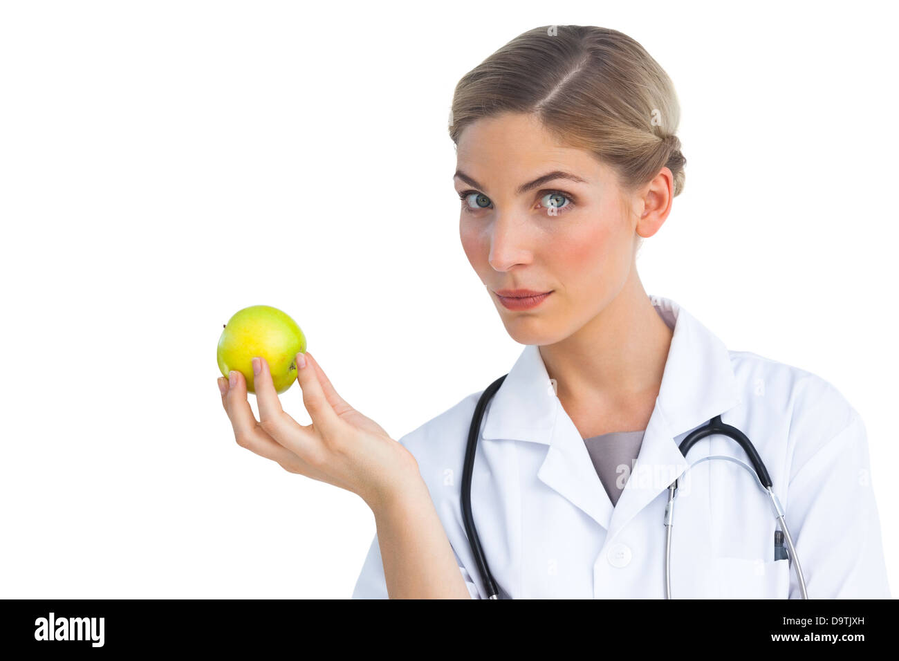 Nurse holding apple Stock Photo - Alamy