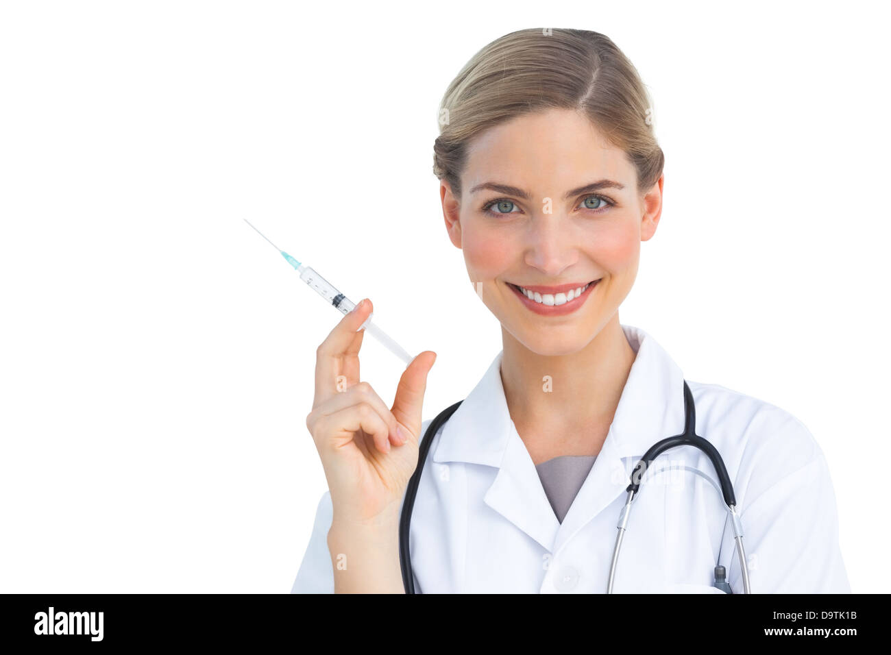 Cheerful nurse holding syringe Stock Photo - Alamy