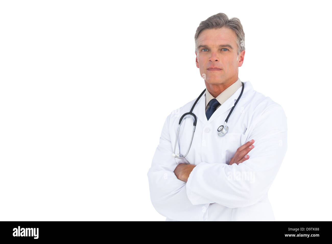 Serious doctor with arms crossed Stock Photo - Alamy