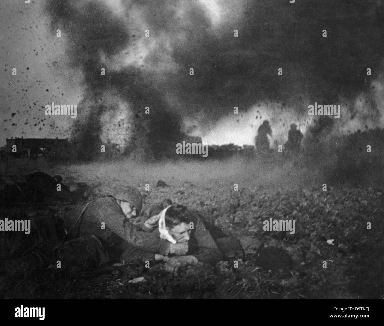 Members of the Red Army shield themselves from shell detonations at the ...
