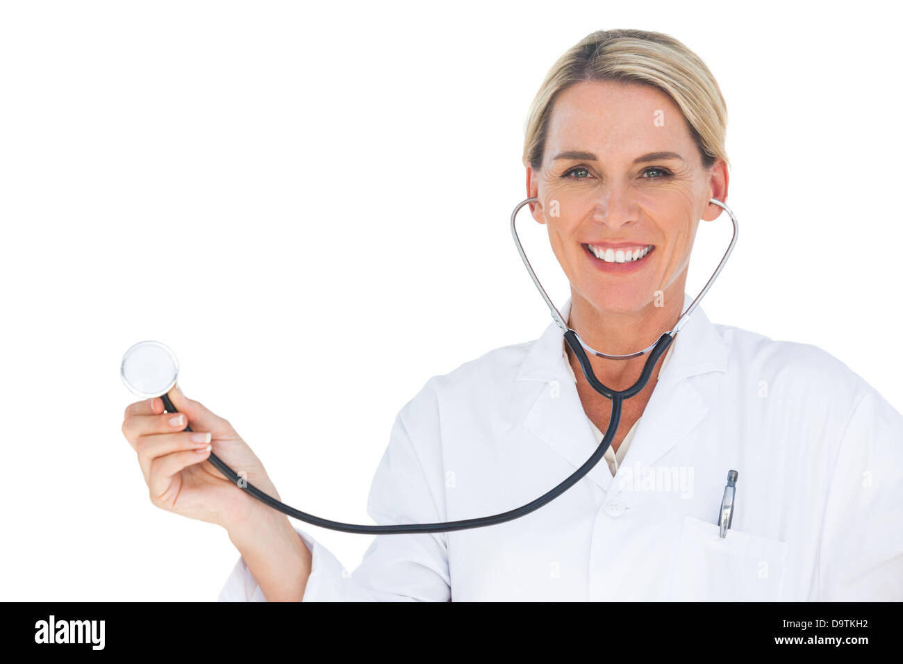 Doctor smiling with stethoscope Stock Photo - Alamy