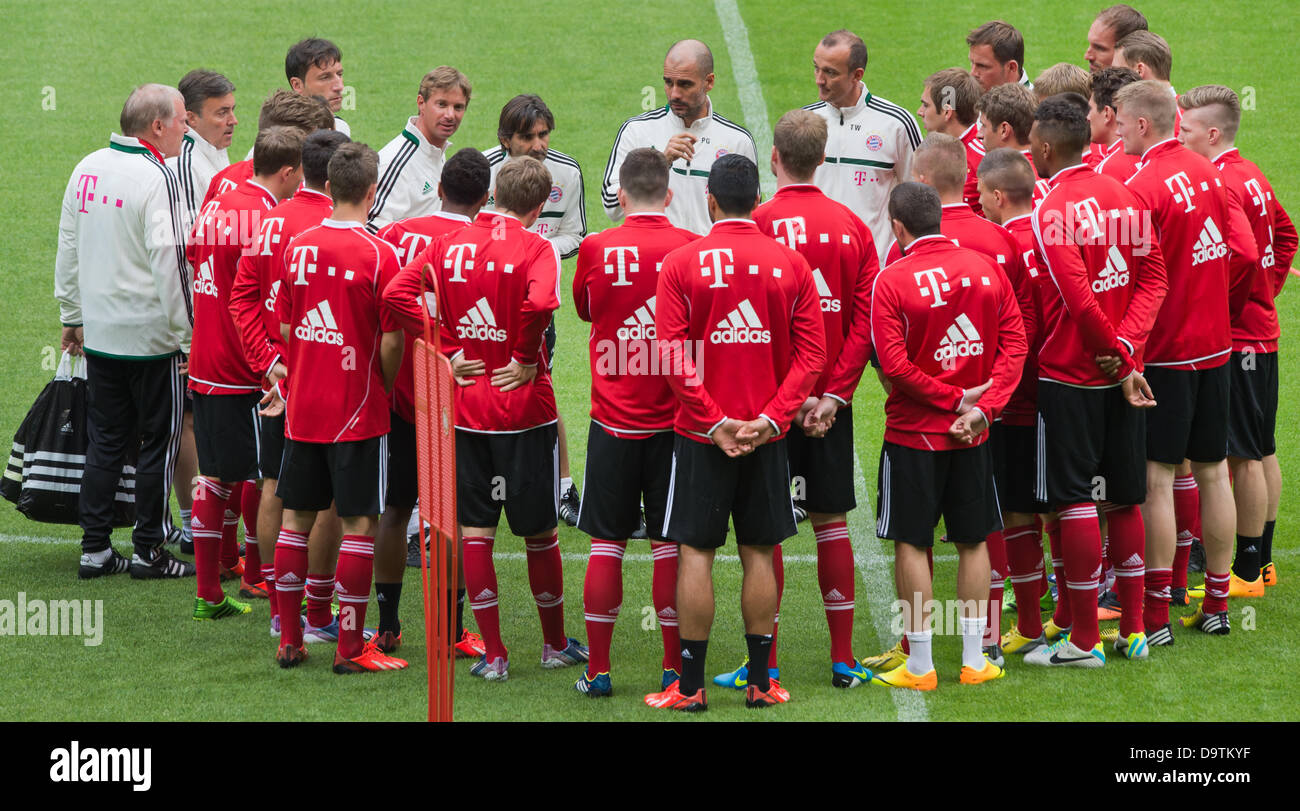 FC Bayern Munich's head coach Pep Guardiola (C) takes part in the year ...