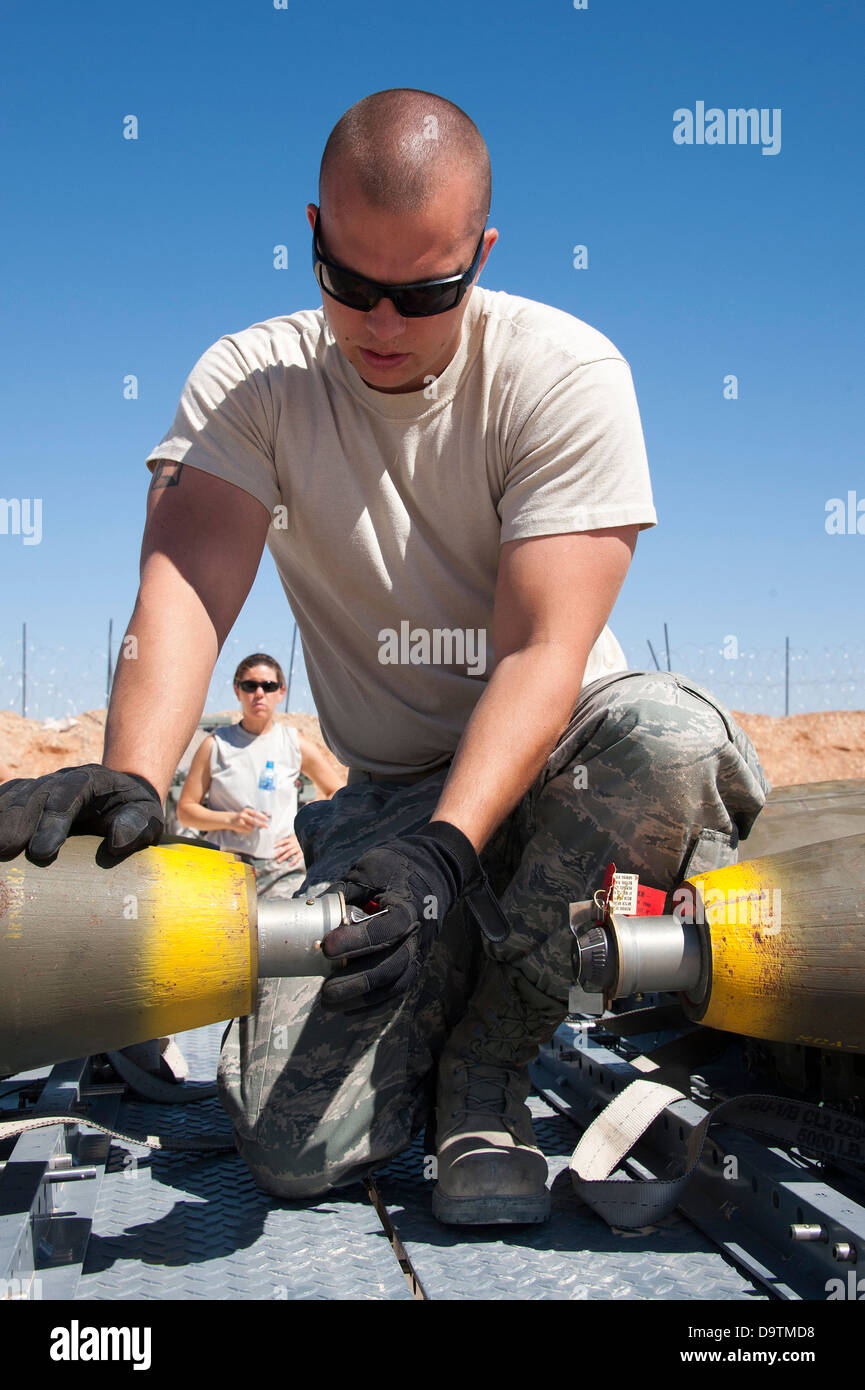 First Lieutenant Aimee Zick, a 140th Wing Maintenance Officer, looks on ...
