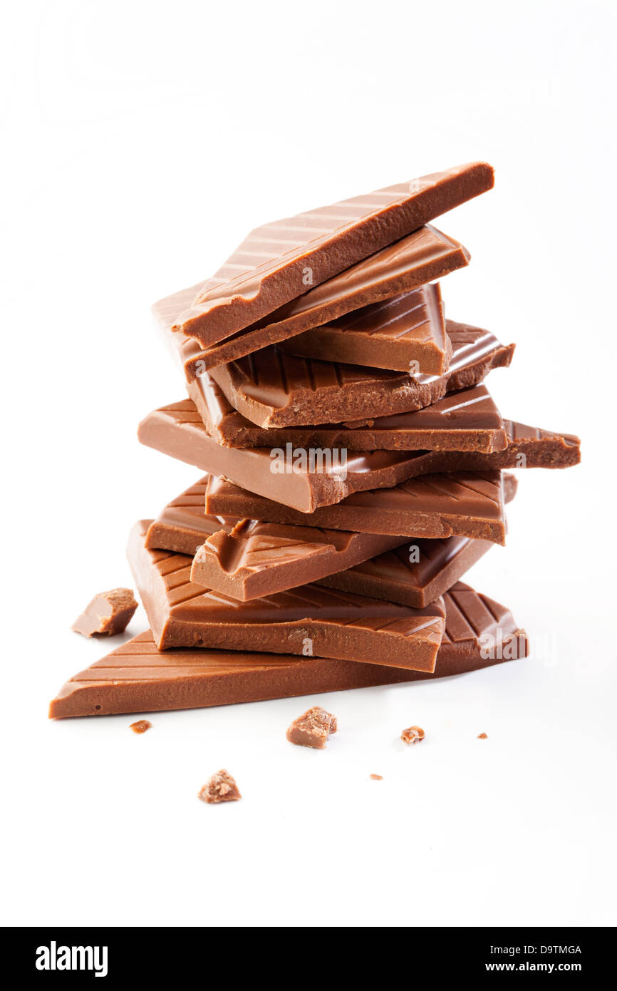 Stack of chocolate on white background Stock Photo - Alamy