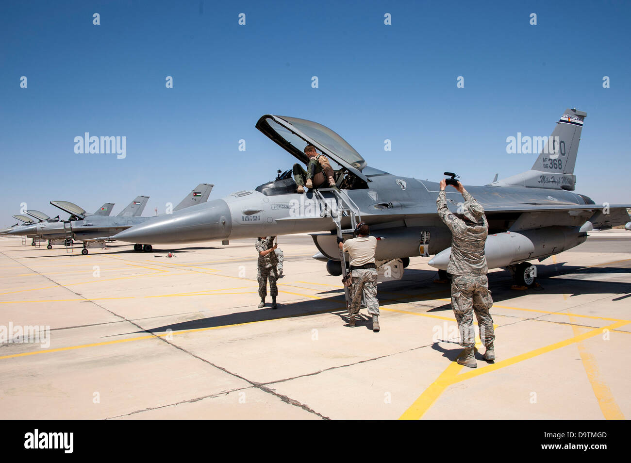 Technical Sgt. Byron K. Coulter (right) records the scramble ...
