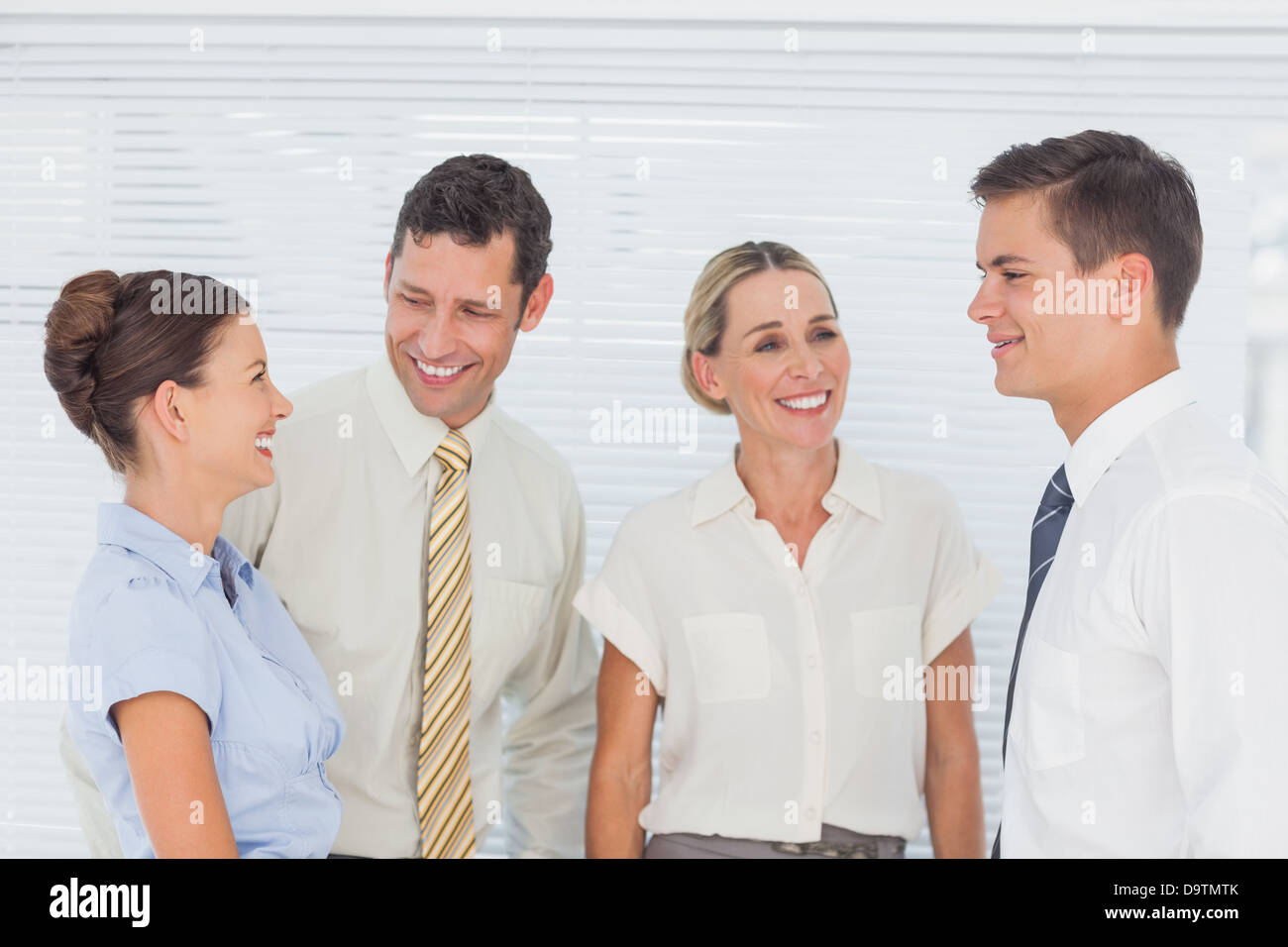 Handsome businessman laughing talking hi-res stock photography and ...