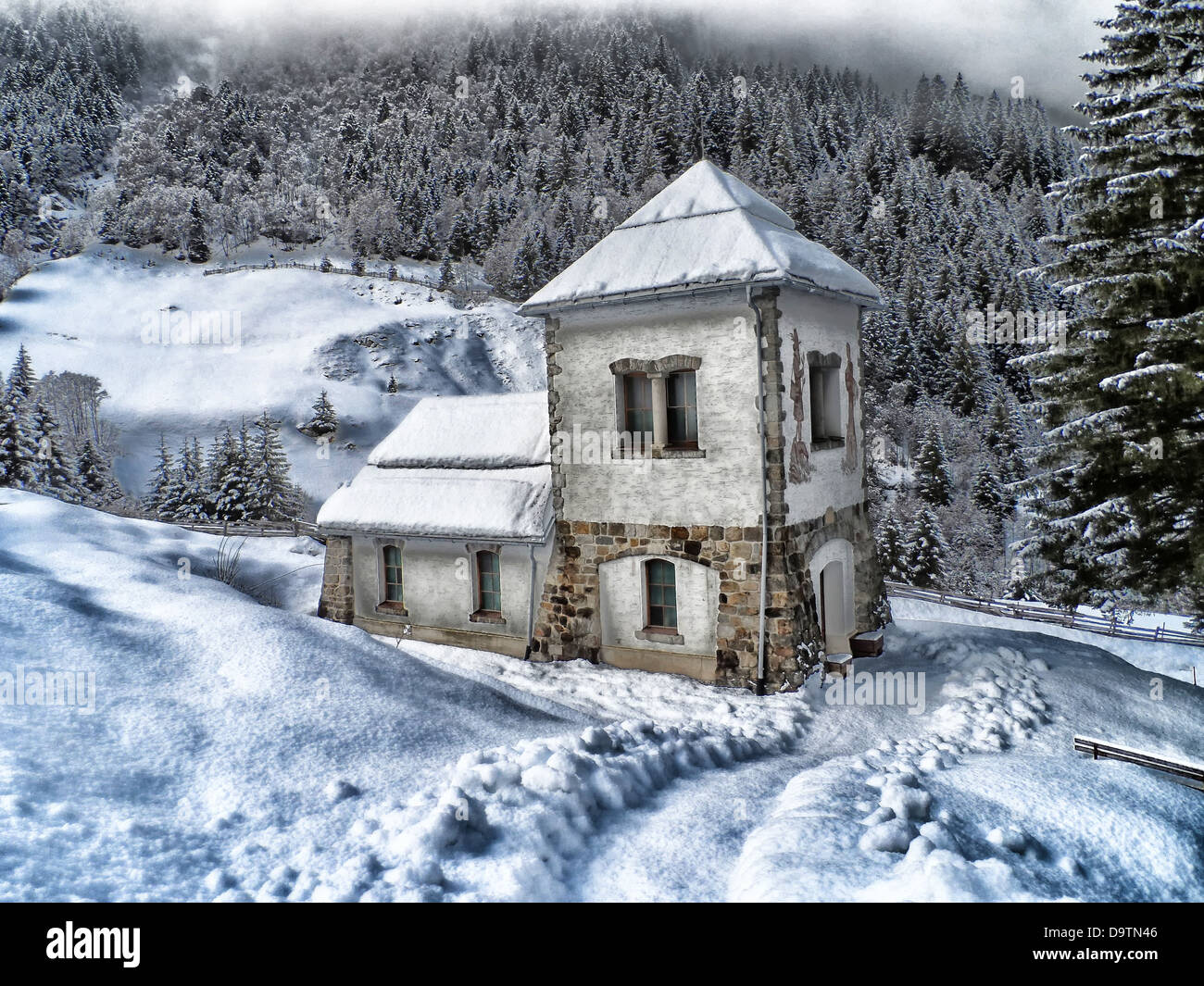 A scenic view of the Austrian countryside featuring a traditional house ...