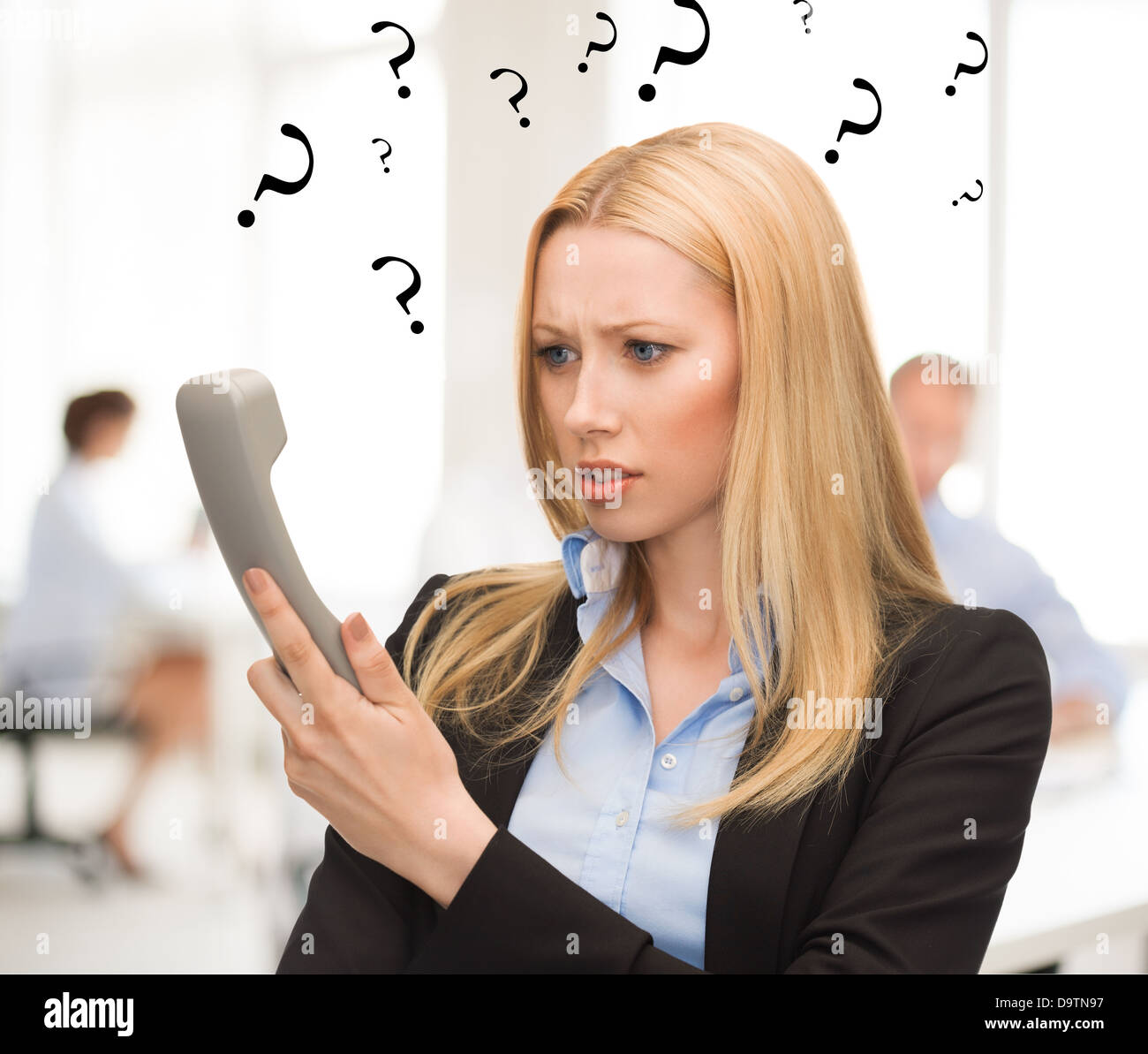 confused woman with phone in office Stock Photo - Alamy