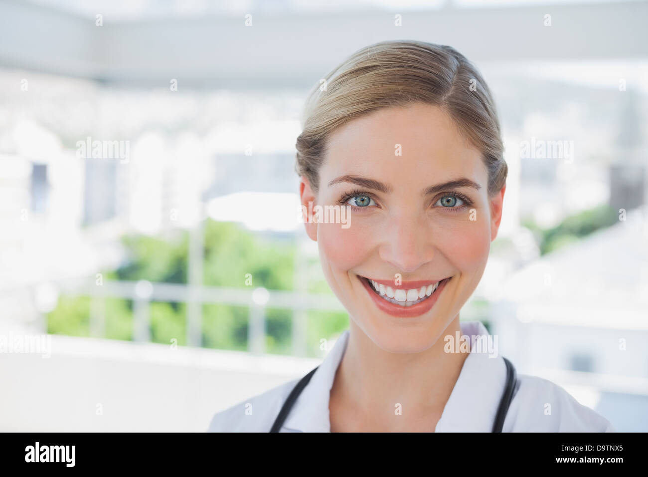 Beautiful smiling doctor woman hi-res stock photography and images - Alamy