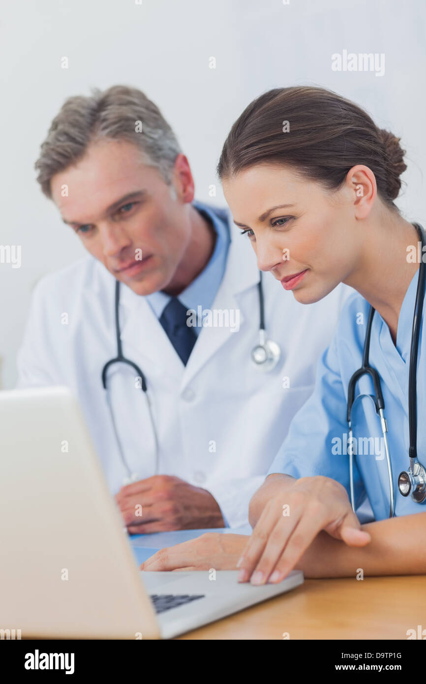 Focused on screen hi-res stock photography and images - Alamy