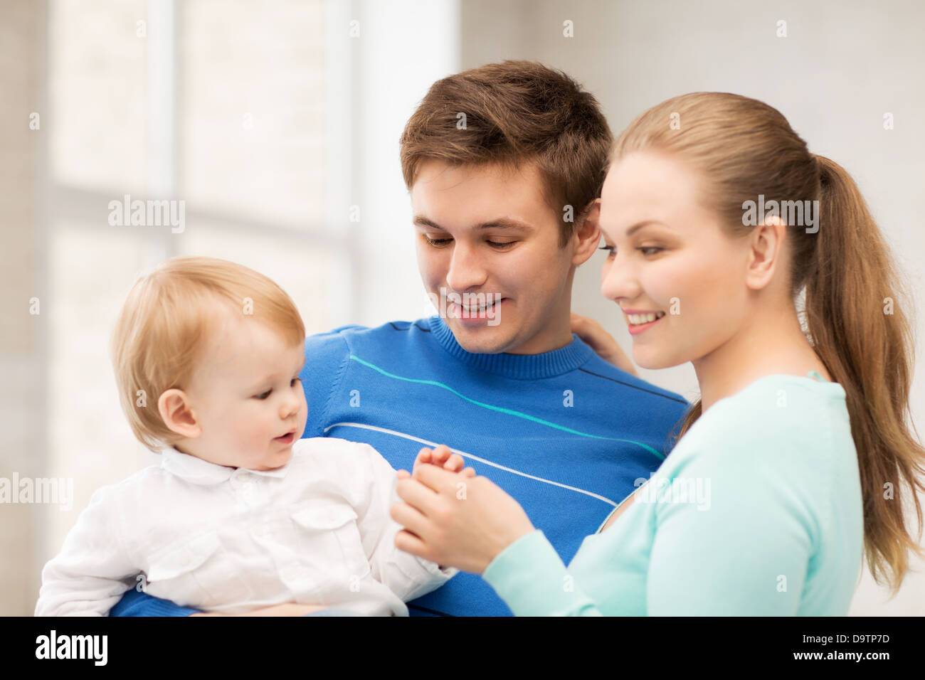 happy family with adorable baby Stock Photo - Alamy