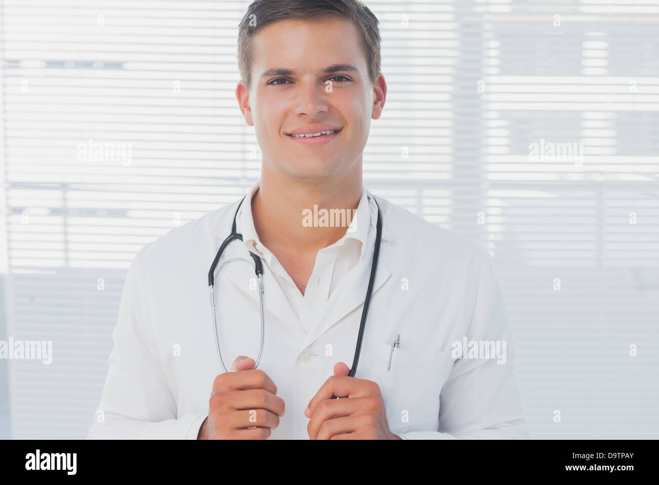 Portrait of an attractive doctor Stock Photo - Alamy