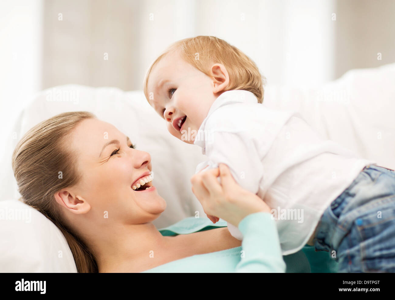 happy mother with adorable baby Stock Photo - Alamy
