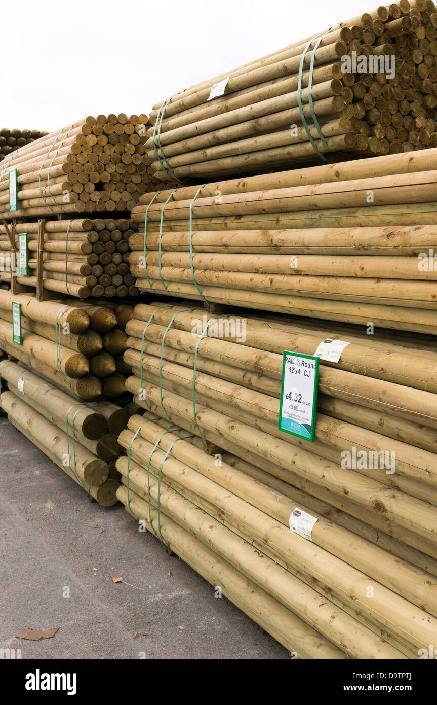 Stacked and bundled wooden timber fence posts Stock Photo - Alamy