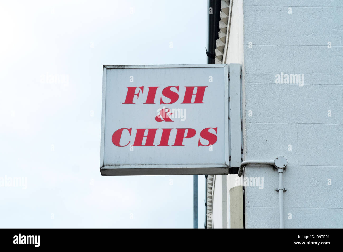 Looking up at UK Fish and Chip shop sign Stock Photo - Alamy