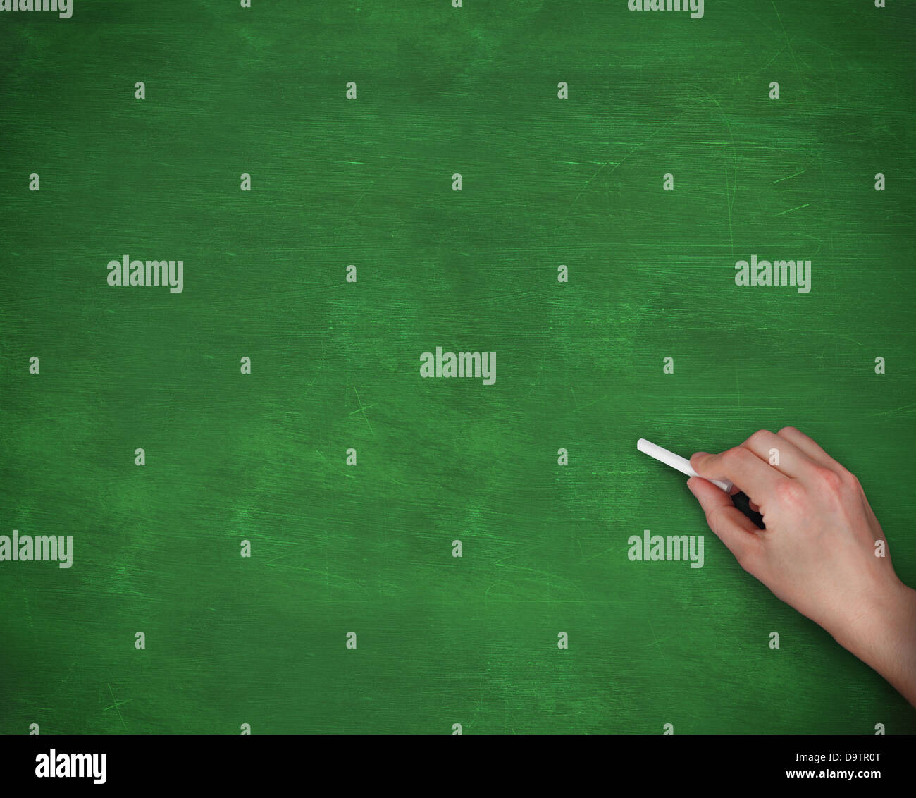 Hand holding chalk Stock Photo - Alamy