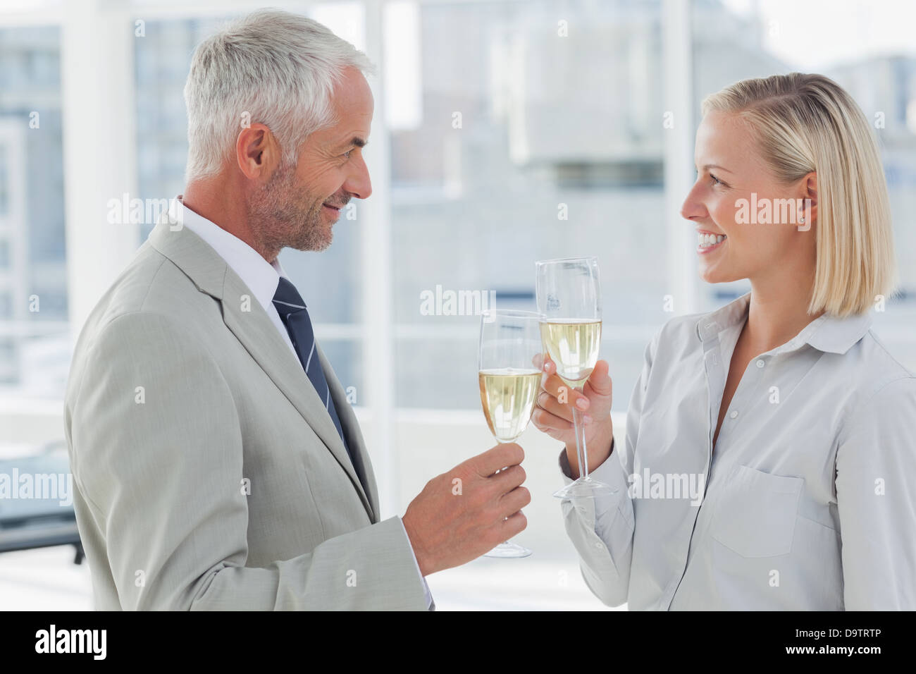 Happy business partners hi-res stock photography and images - Alamy