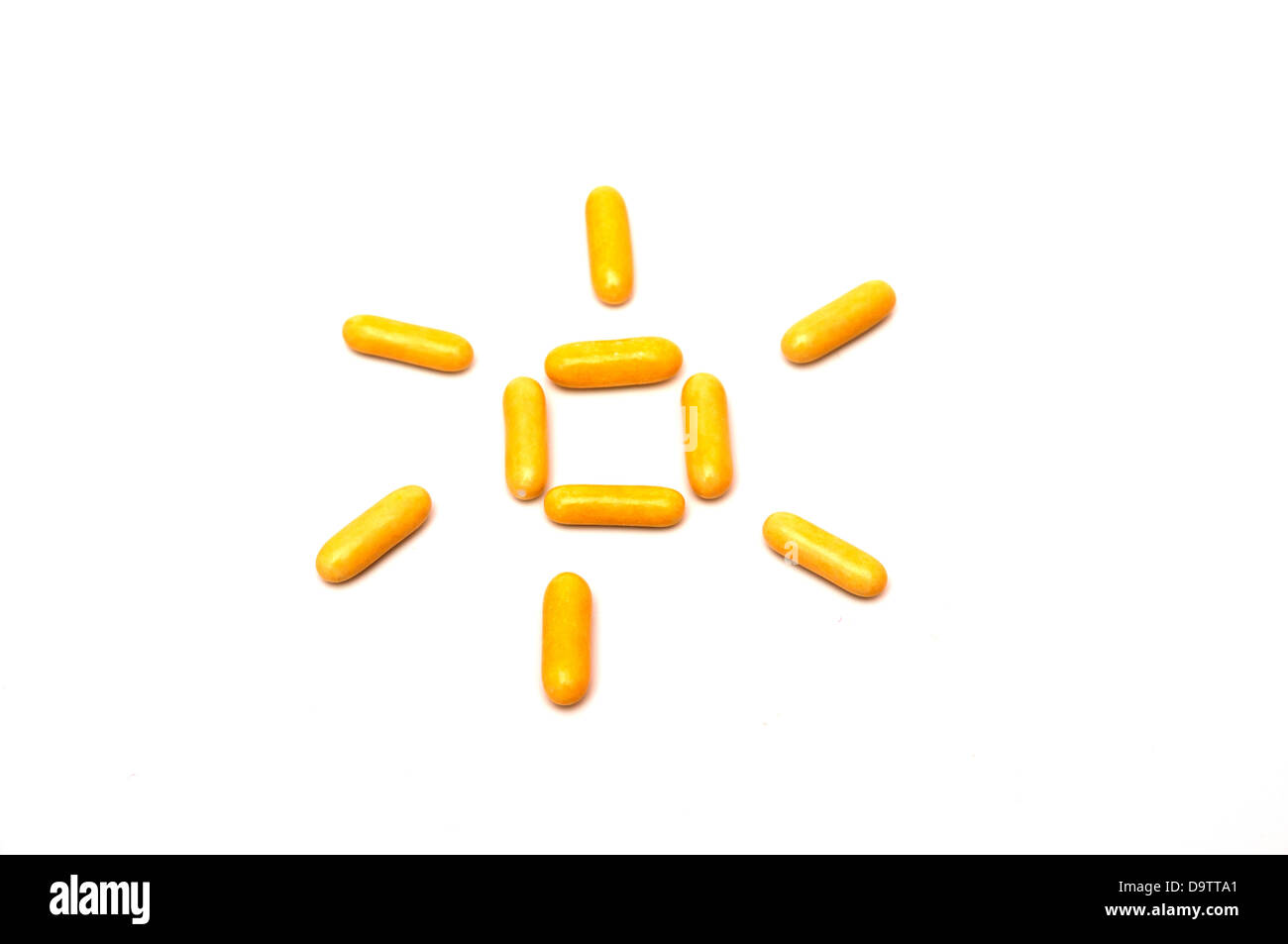 sun of candy on a white background Stock Photo - Alamy