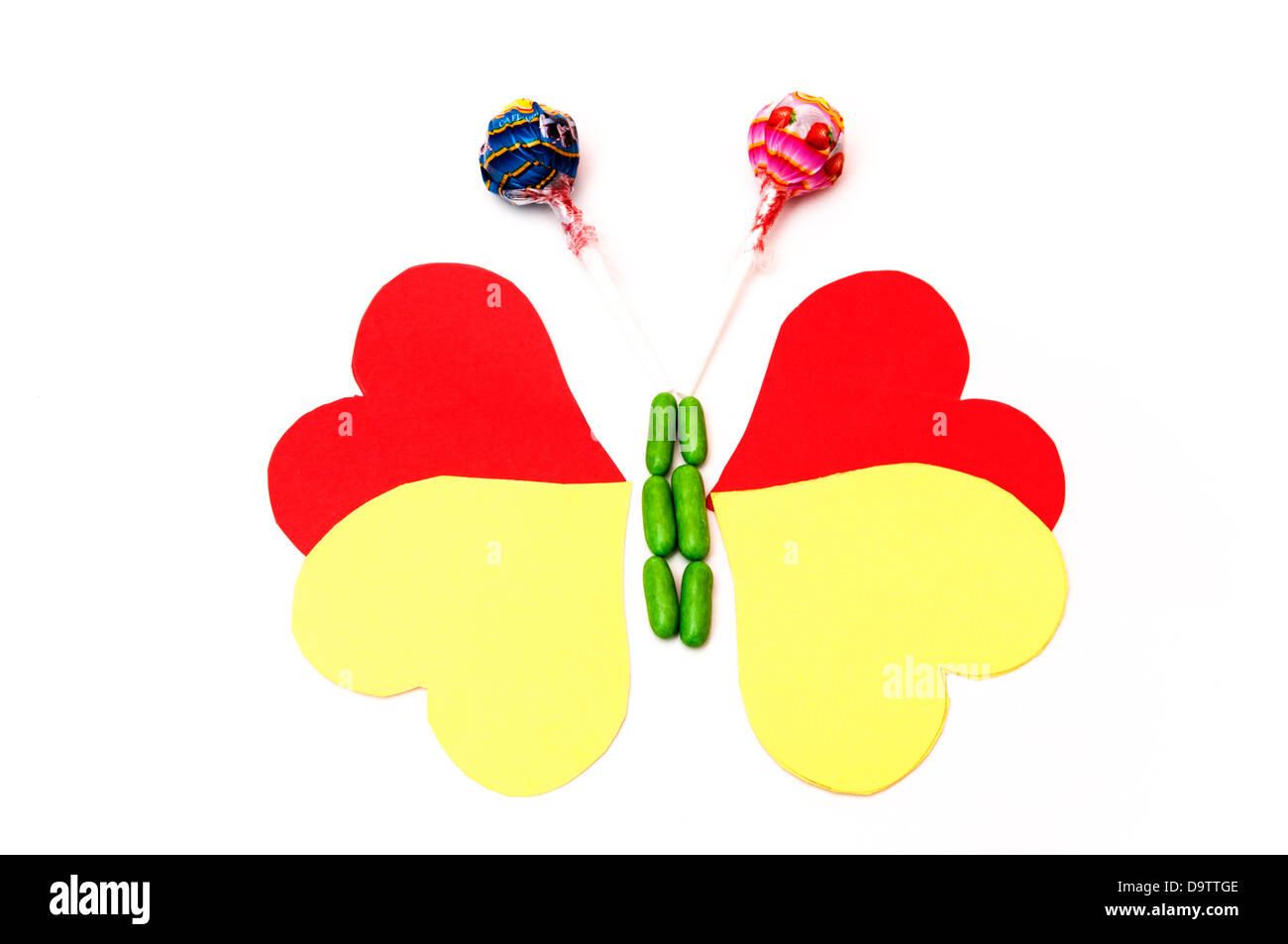 drawing of a butterfly with hearts and candy on a white background ...