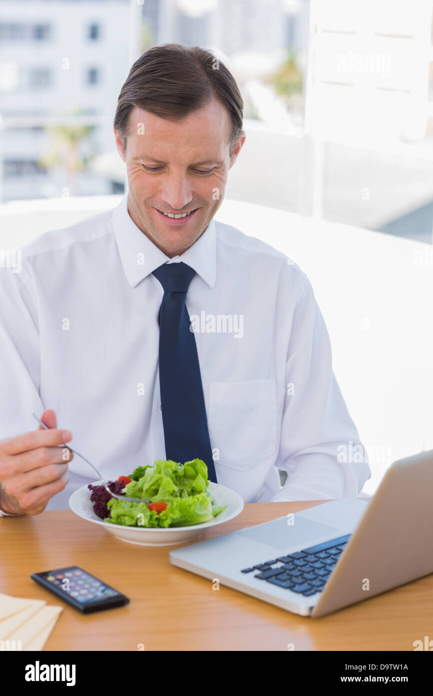 Eating at office desk man hi-res stock photography and images - Alamy