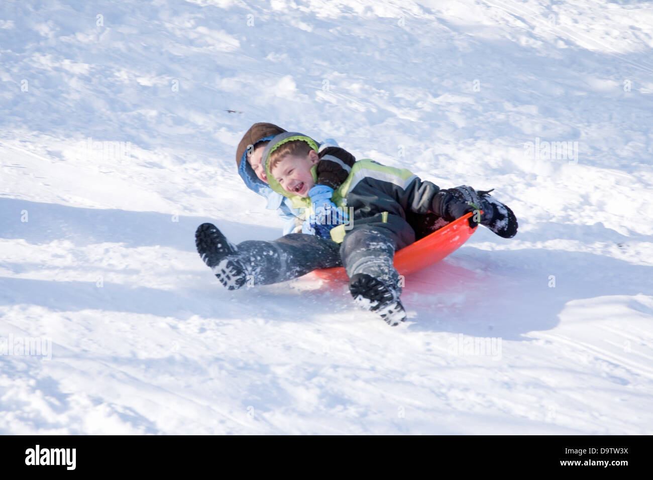 Sleigh riding with two little boys in fresh snow near Lexington, Ma ...