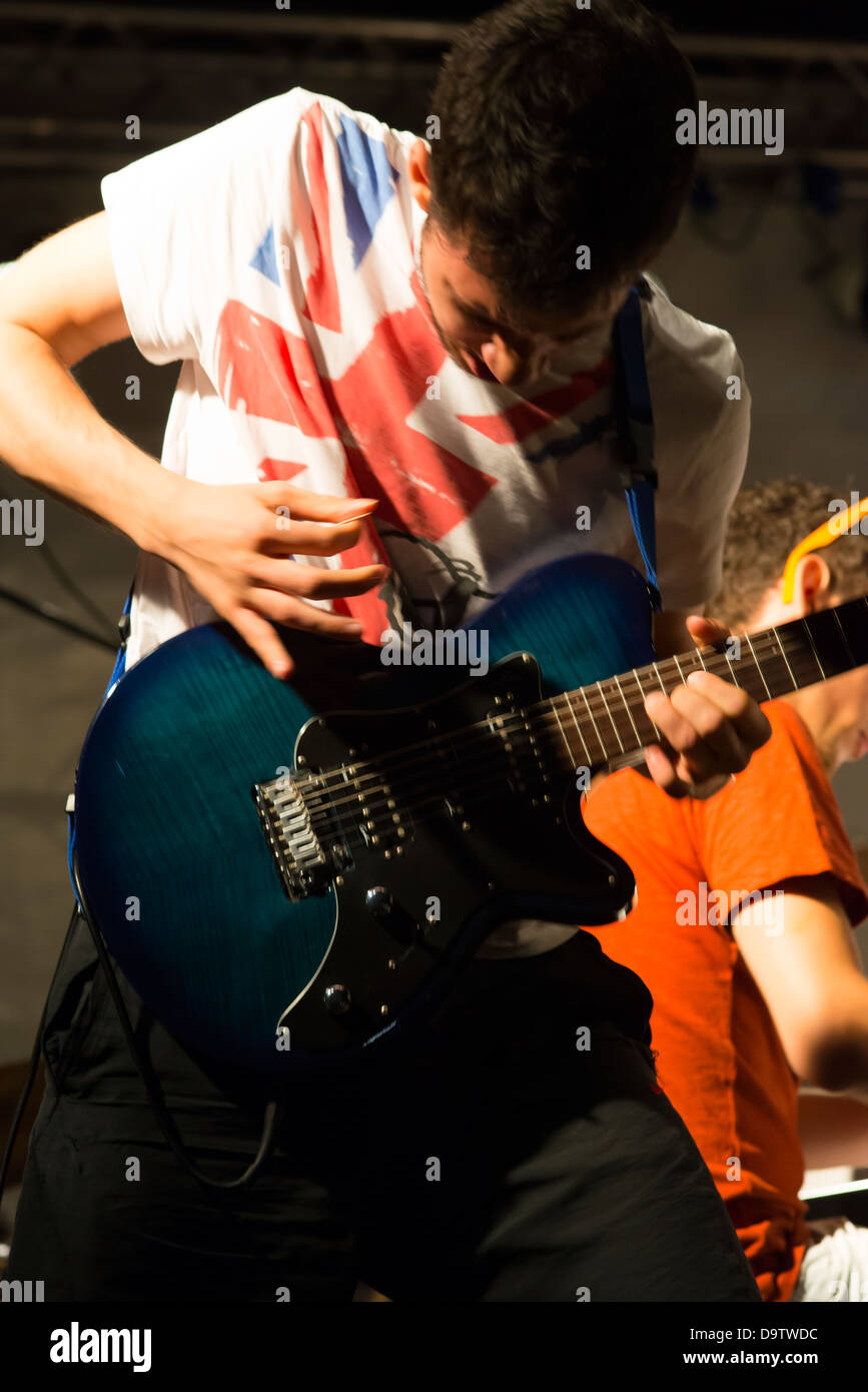 Rock concert man playing guitar hi-res stock photography and images - Alamy