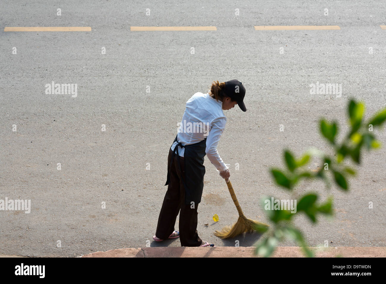 Female road sweeper hi-res stock photography and images - Alamy