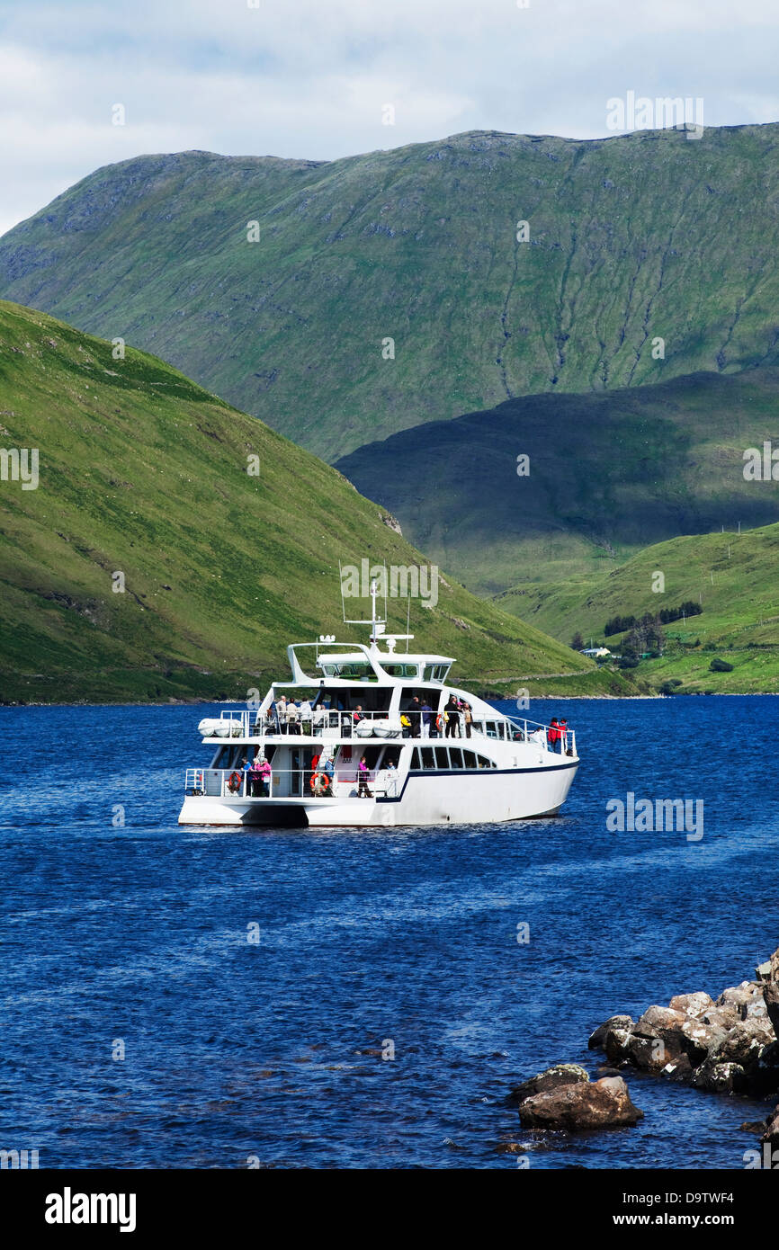 Passengers on a boat ride into killary harbour;County galway ireland ...