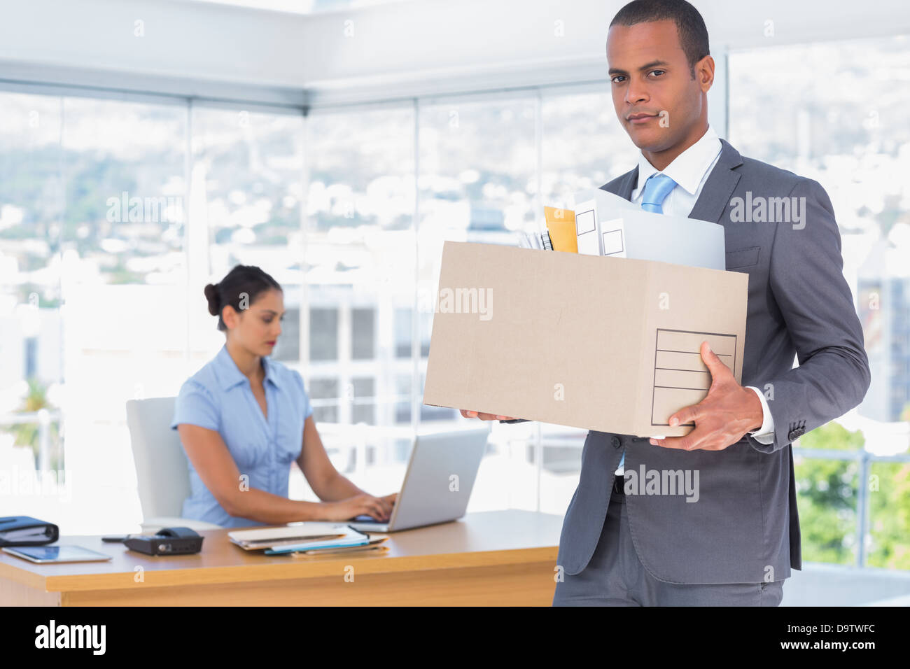 Sitting laptop leaving hi-res stock photography and images - Alamy