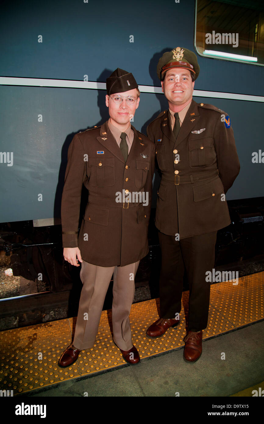 Two 1940's male soldiers pose in front of Pearl Harbor Day Troop train ...