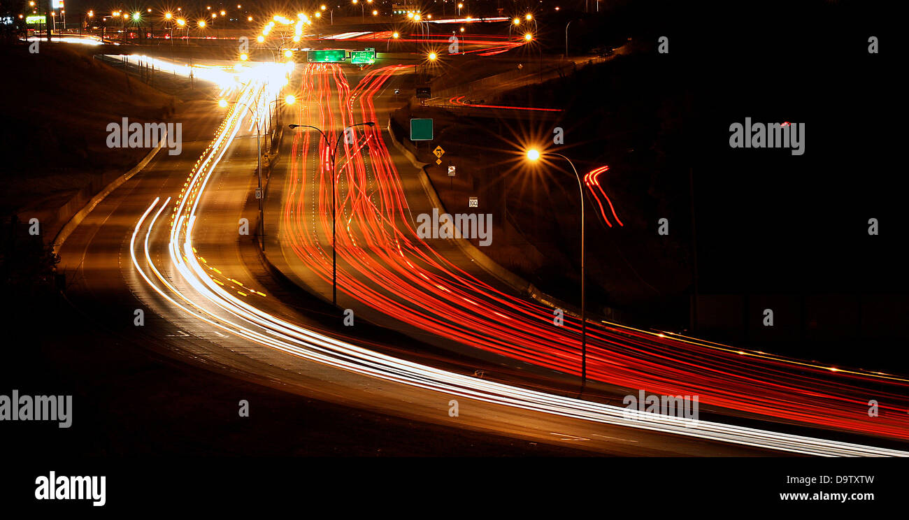 Canada, Alberta, Calgary, Highway system around metropolis by night ...