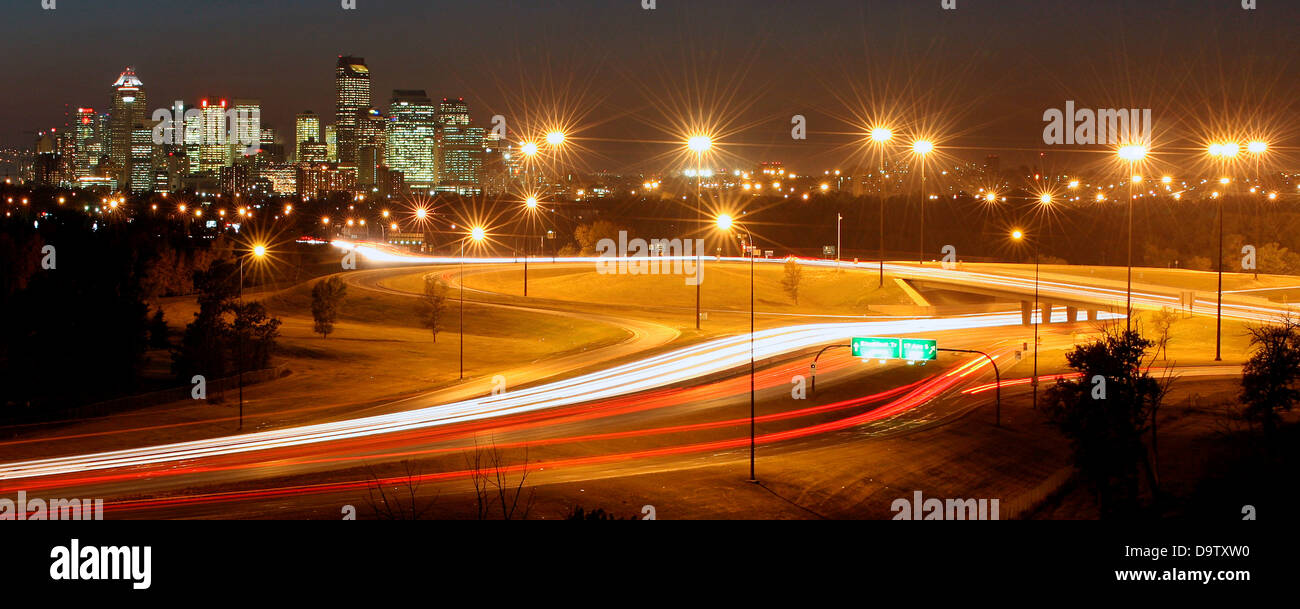 Canada, Alberta, Calgary, Highway system around metropolis by night ...