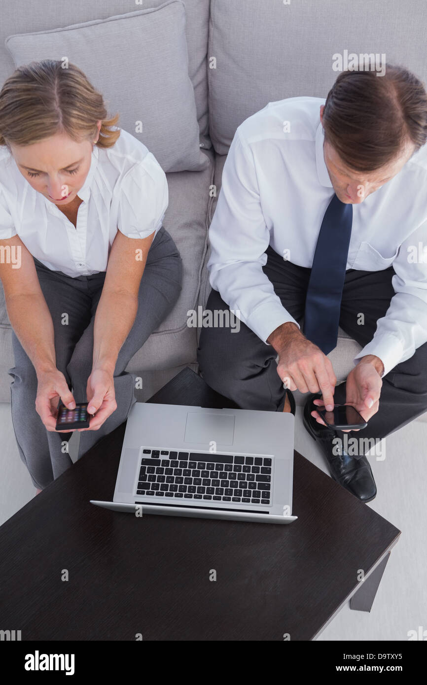 Overhead of business people using their mobile phones Stock Photo - Alamy Overhead of business people using their mobile phones Stock Photo - Alamy